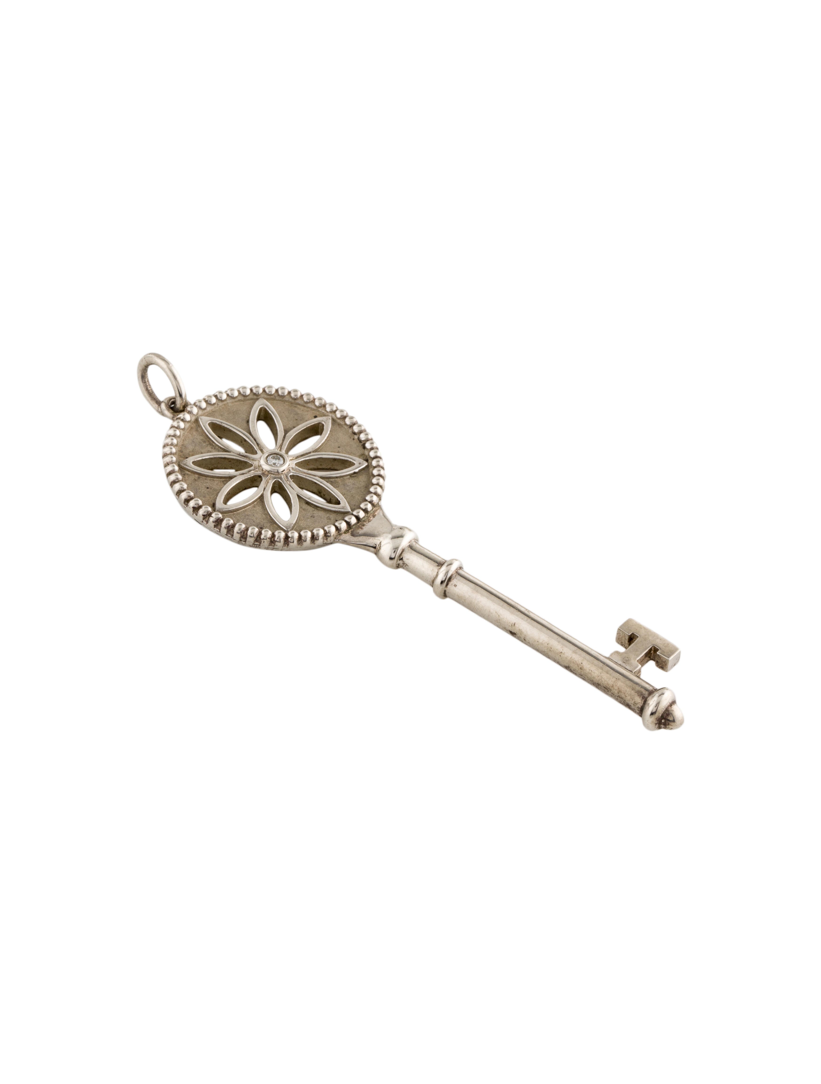 Tiffany & Co. Diamond Daisy Key Pendant - Sterling Silver Pendant ...
